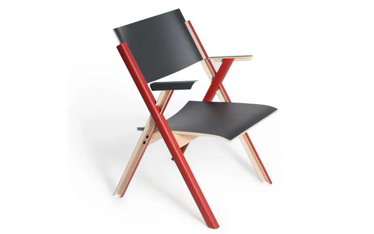 The Cross Easy Chair uses linoleum and veneers, but still looks luxe ...