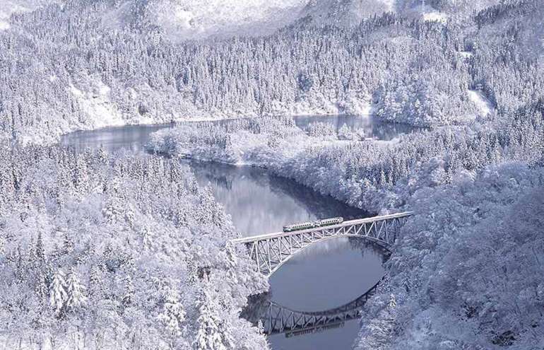 The $11 train ride through Japan’s scenic and snowy landscape while you ...